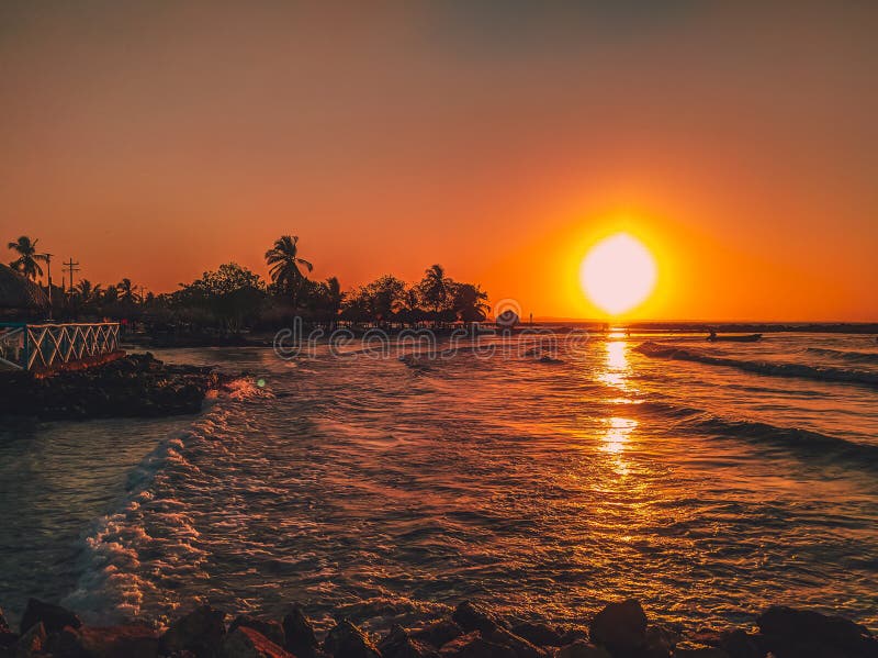 Sunset beach Colombia stock image. Image of light, shore - 249915937