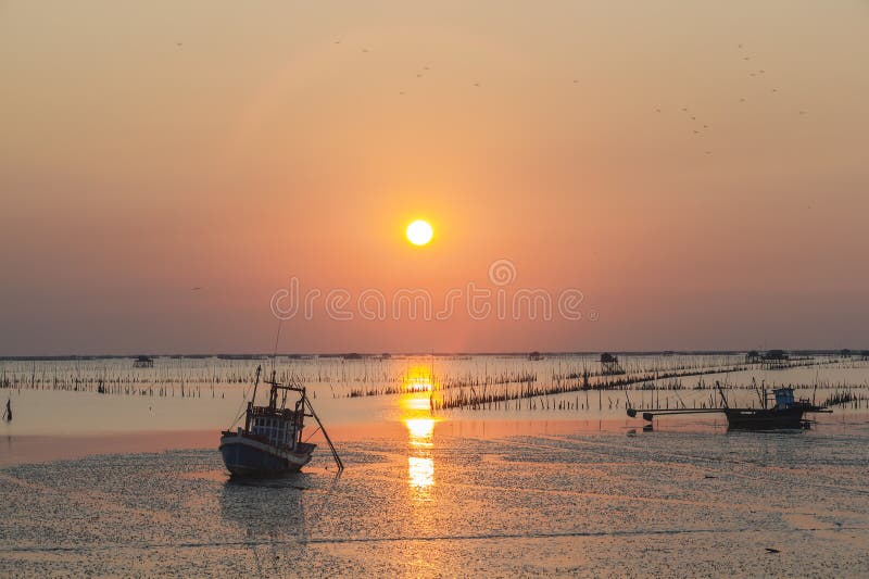 Sunset Beach and Fishing Boat Stock Image - Image of romantic, boat ...