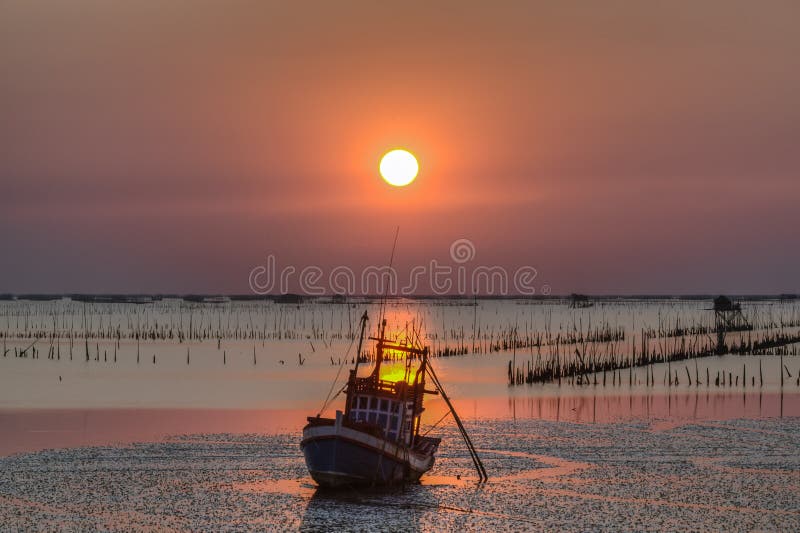 Sunset Beach and Fishing Boat Stock Photo - Image of color, peace: 29281776