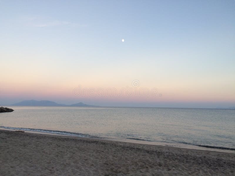 Sunset Beach Greece stock photo. Image of sunset, greece - 132029404