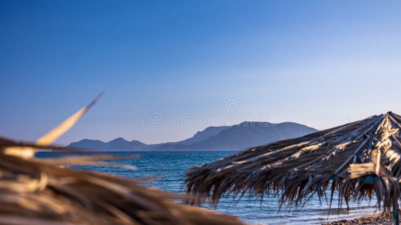 Sunset at the beach in kos stock image. Image of colorful - 252873215