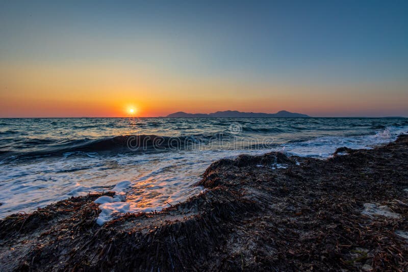 Sunset at the beach in kos stock image. Image of decoration - 254016177