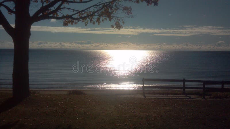 Sunset stock photo. Image of lakeside, evening, beach - 150670346