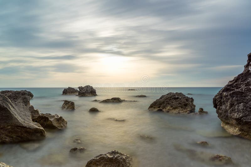 Sunset at the Beach in Lefkada Stock Photo - Image of cloudy, azure ...