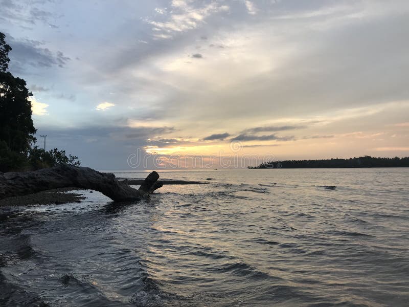 Sunset Nabire Papua Indonesia Stock Image - Image of tropical, water ...