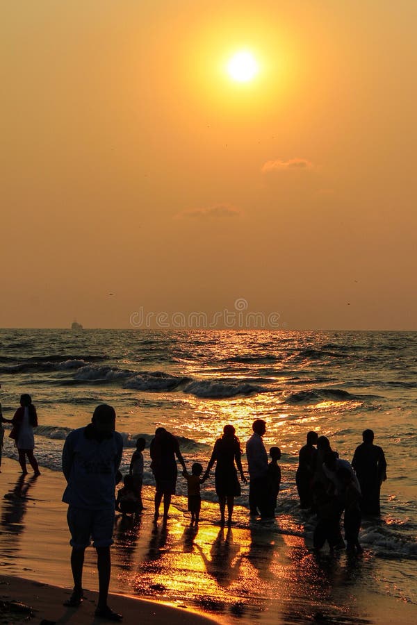 Sunset at the Beach and People Silhouette Editorial Photography - Image ...