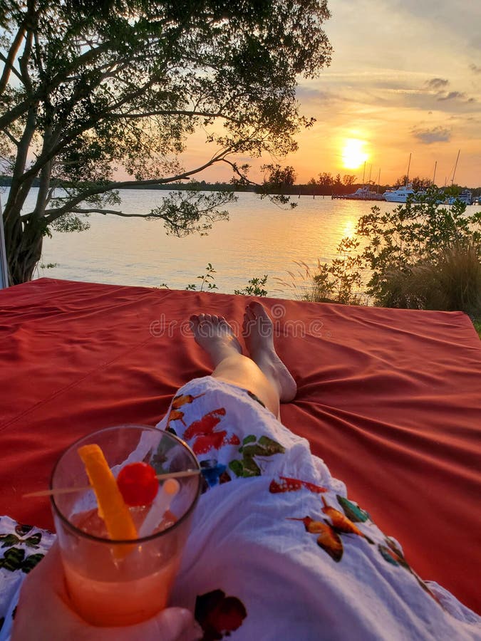 Sunset on the Beach River Resort Life Stock Photo - Image of evening ...