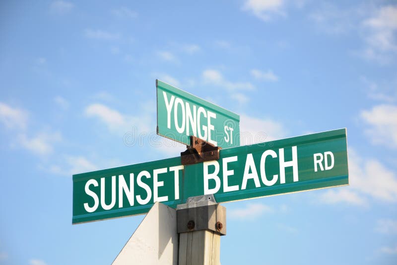 Sunset Beach Road Sign stock photo. Image of sunset, intersection - 6265500