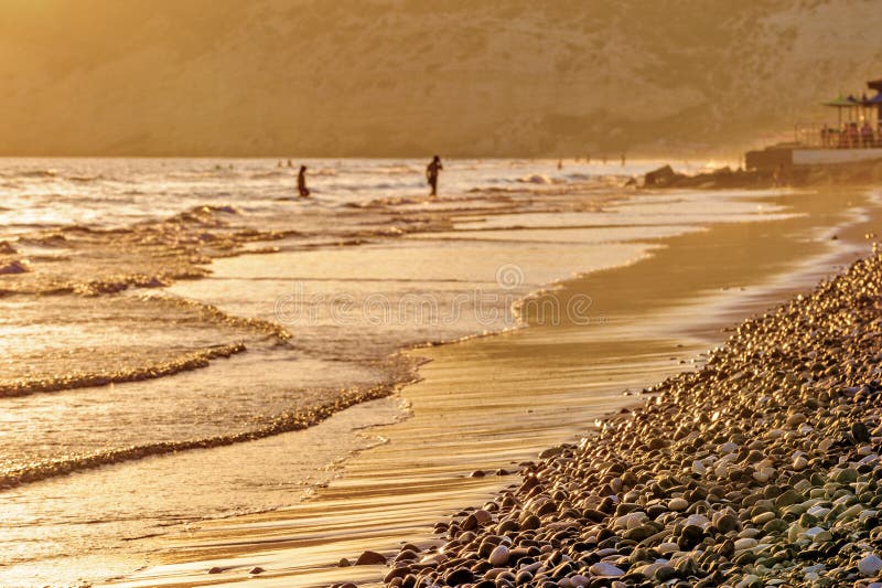 Sunset on beach stock image. Image of shore, sepia, leisure - 34687357