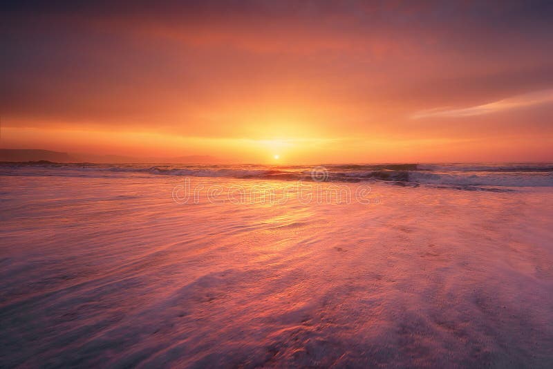 Sunset on beach shore stock photo. Image of dusk, coast - 95828334