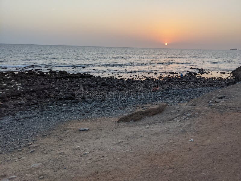 Sunset Beach Showdown stock image. Image of sunset, evening - 231309731