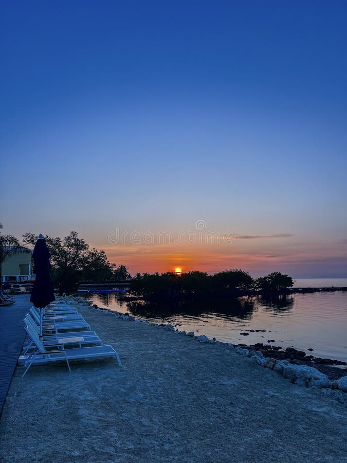 Sunset at the Keys in Key West Stock Image - Image of reflection, beach ...