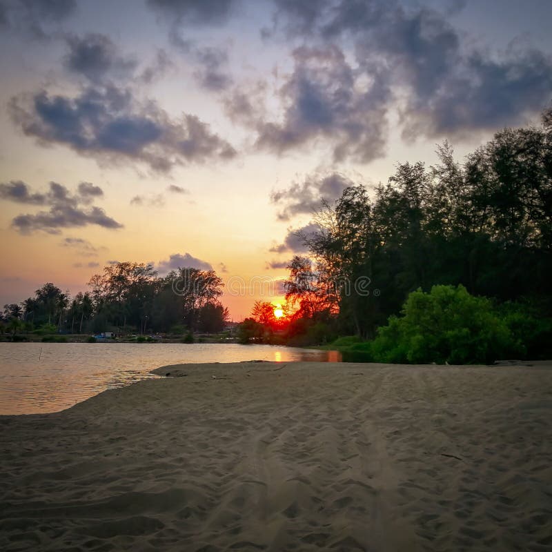 The Sunset on the Beach is Very Beautiful. Stock Image - Image of ...