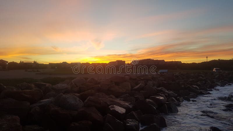 Sunset beachfront stock photo. Image of beachfront, ocean - 163587860