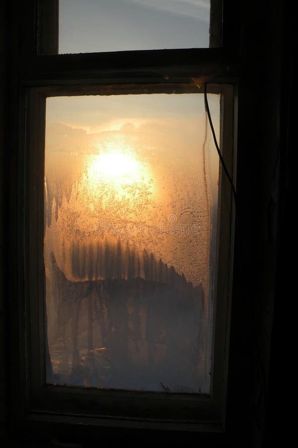 Sunset Beams through the Frozen Glass Window Stock Image - Image of ...