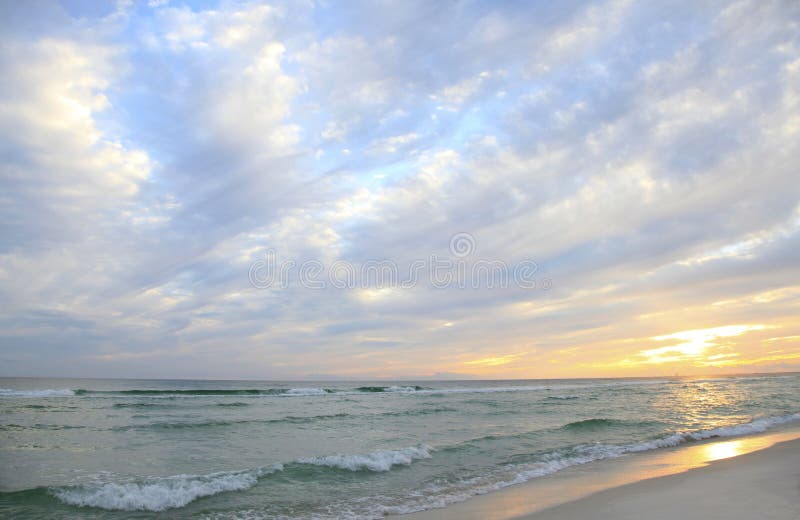 Sunset and Beautiful Clouds on a White Sand Florida Beach Stock Photo ...