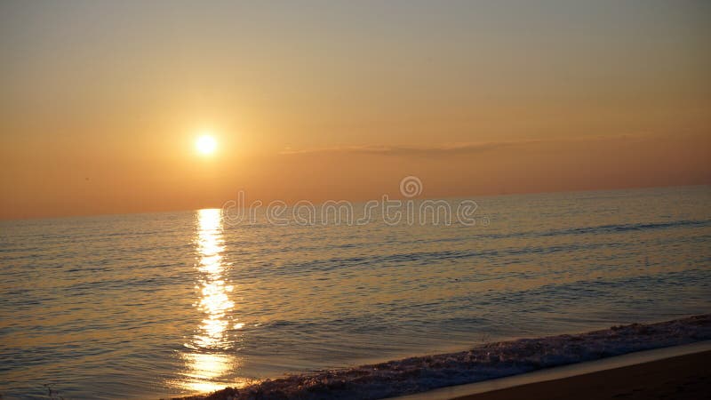 Sunset on Praia de Faro stock photo. Image of water - 110329558