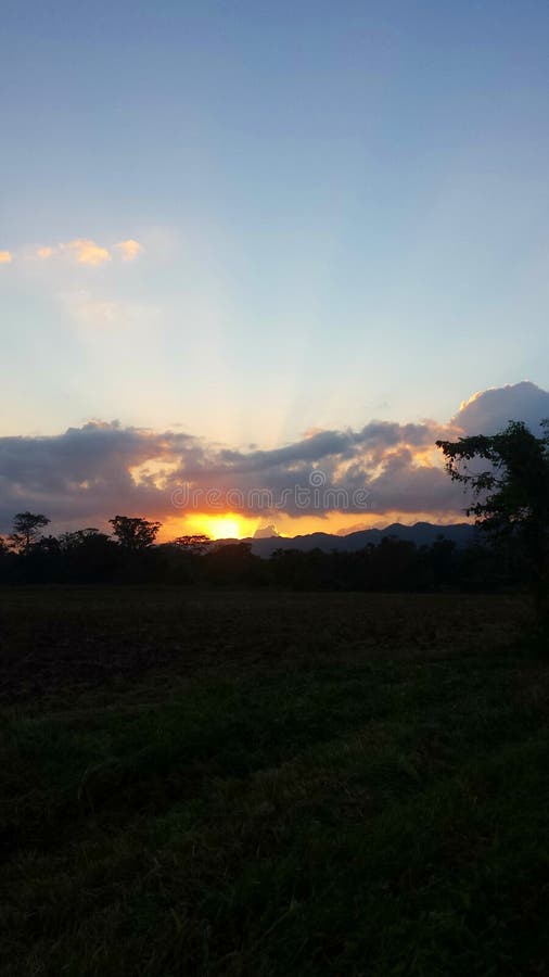 Sunset stock image. Image of rays, sunset, belize, beautiful - 115910325