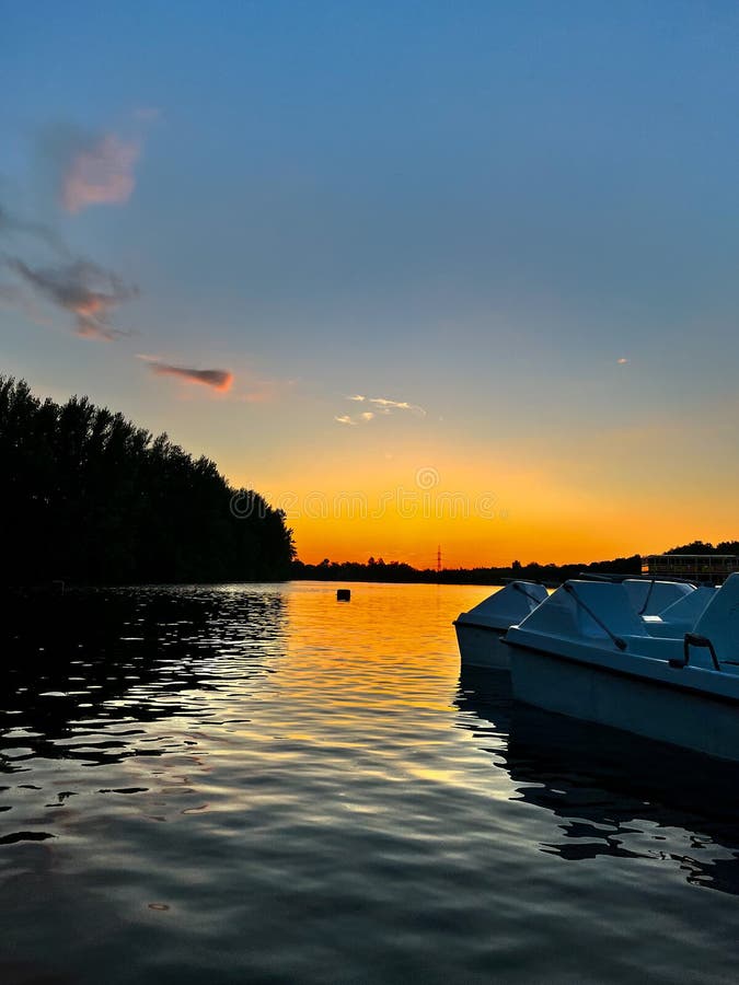 Sunset stock image. Image of river, sunset, boat, nature - 259878267