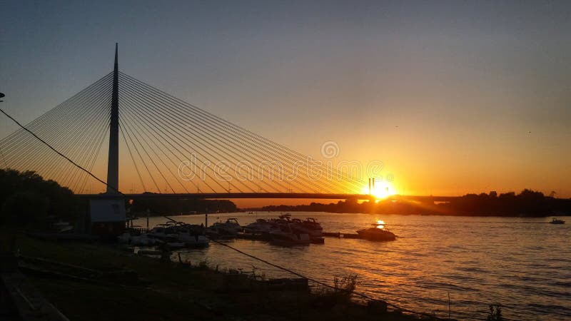 Sunset behind bridge stock image. Image of achitecture - 82086429