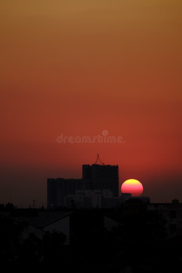 Sunset stock image. Image of sunset, setting, building - 65012065