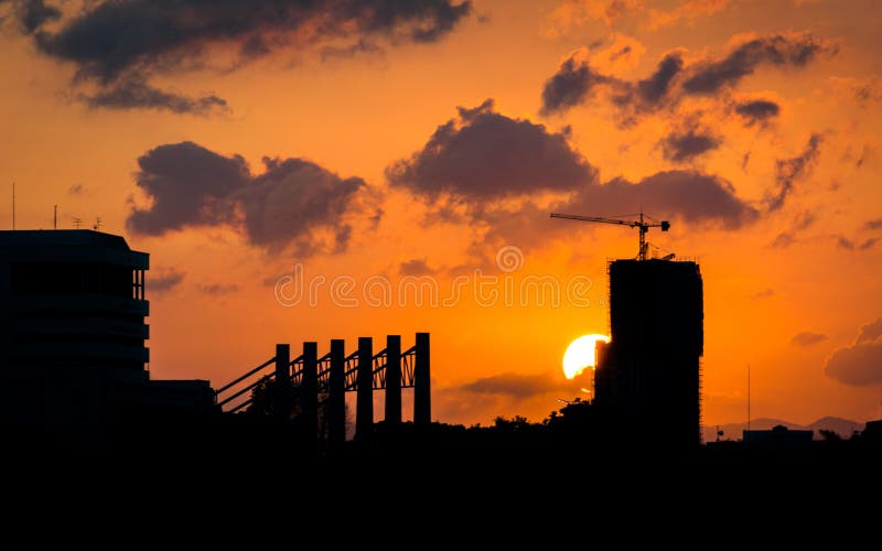 Sunset Behind a Building Under Construction. Stock Image - Image of ...