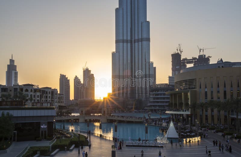 Sunset behind Burj Khalifa editorial stock photo. Image of square ...