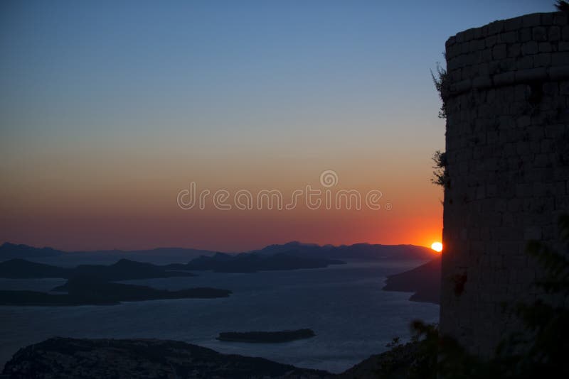 Sunset behind a castle stock photo. Image of tropical - 28534824