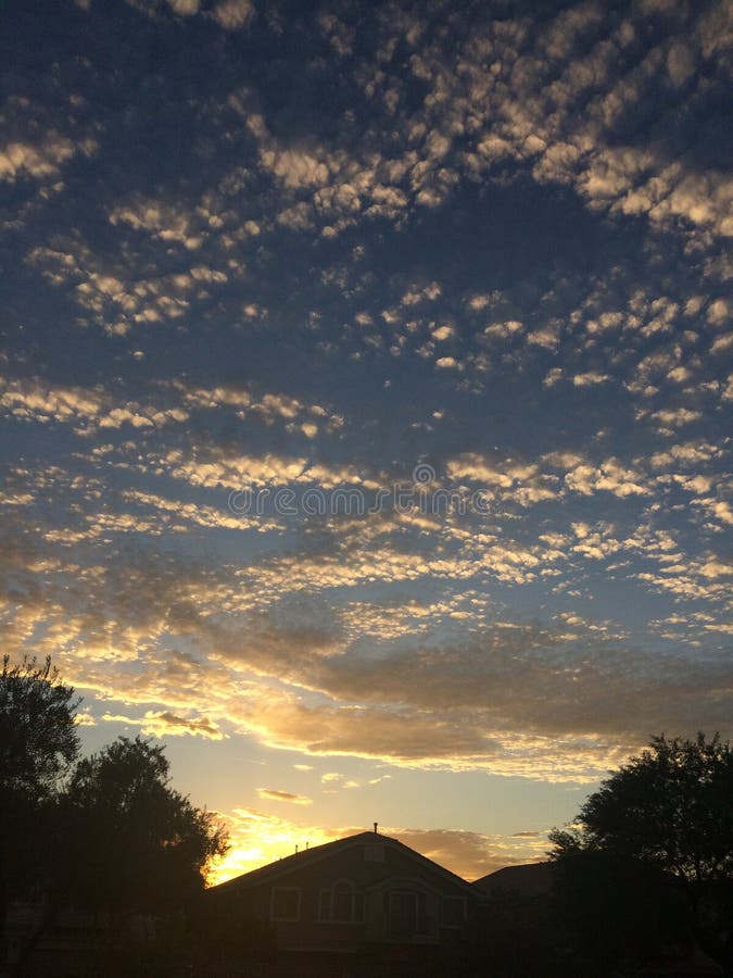 Sunset behind the clouds stock image. Image of clouds - 99760955