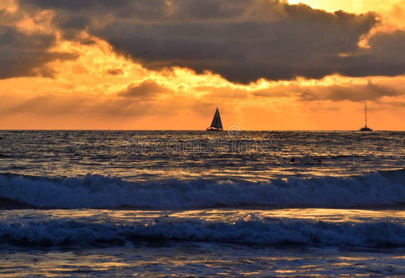 Sunset Behind Clouds Over Pacific Ocean Stock Photo - Image of sunrise ...