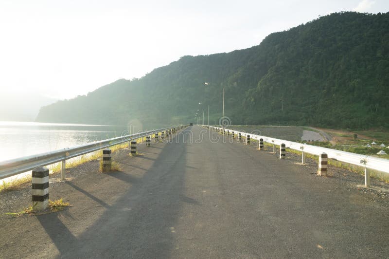 Sunset behind the dam stock image. Image of atmosphere - 100717261