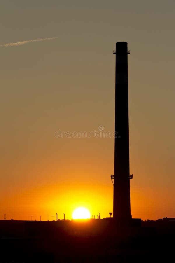 Sunset Behind a Factory Chimney Stock Photo - Image of exhaust ...