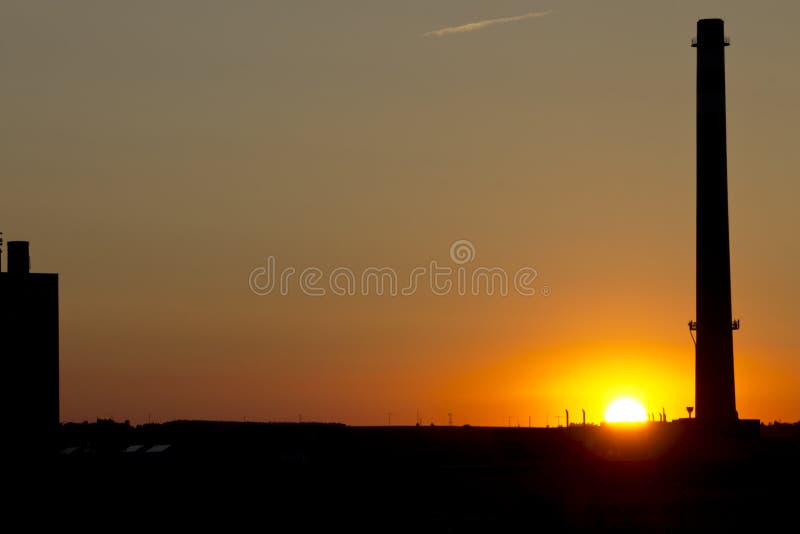 Sunset Behind a Factory Chimney Stock Image - Image of orange ...