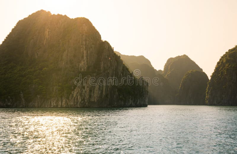 Sunset Behind the Halong Bay Rocks in Vietnam Stock Image - Image of ...