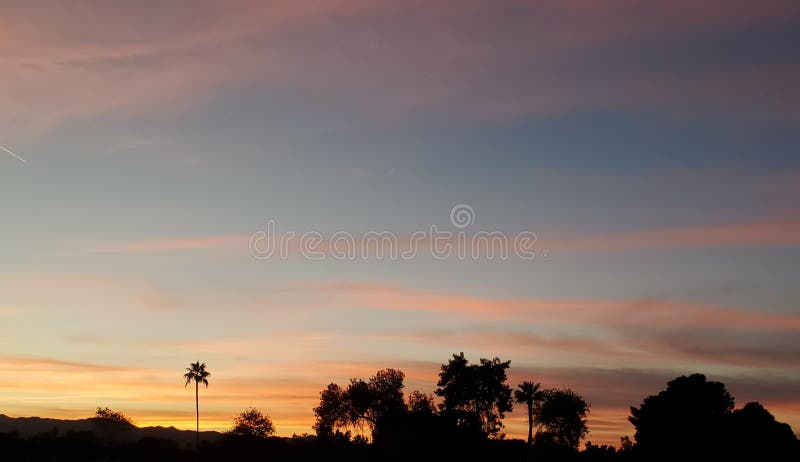 Sunset behind the house stock photo. Image of sunrise - 209946042