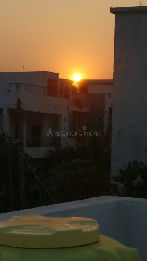 Beutiful Sunset in Middle of Houses Nice Wallpaper Stock Photo - Image ...