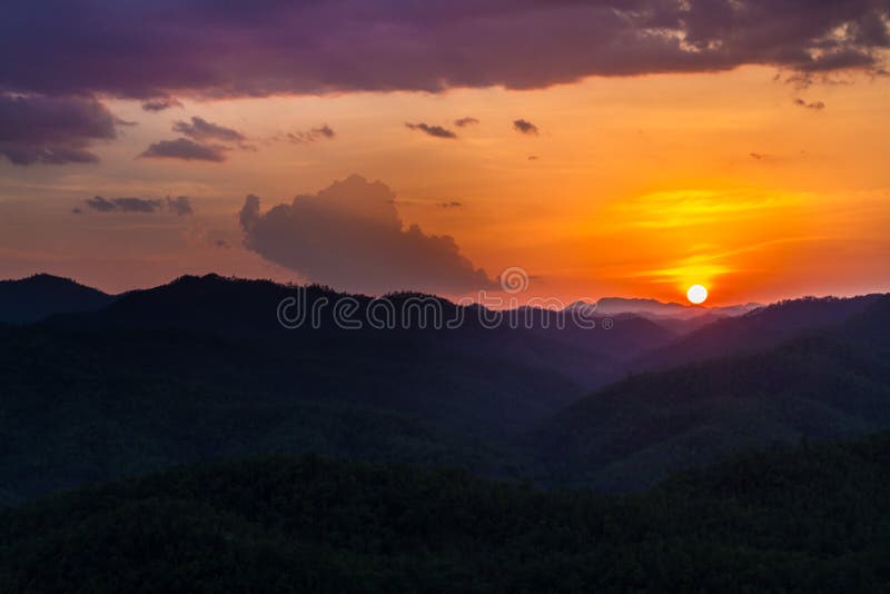 Sunset stock image. Image of cloudy, sunset, mountain - 43642193