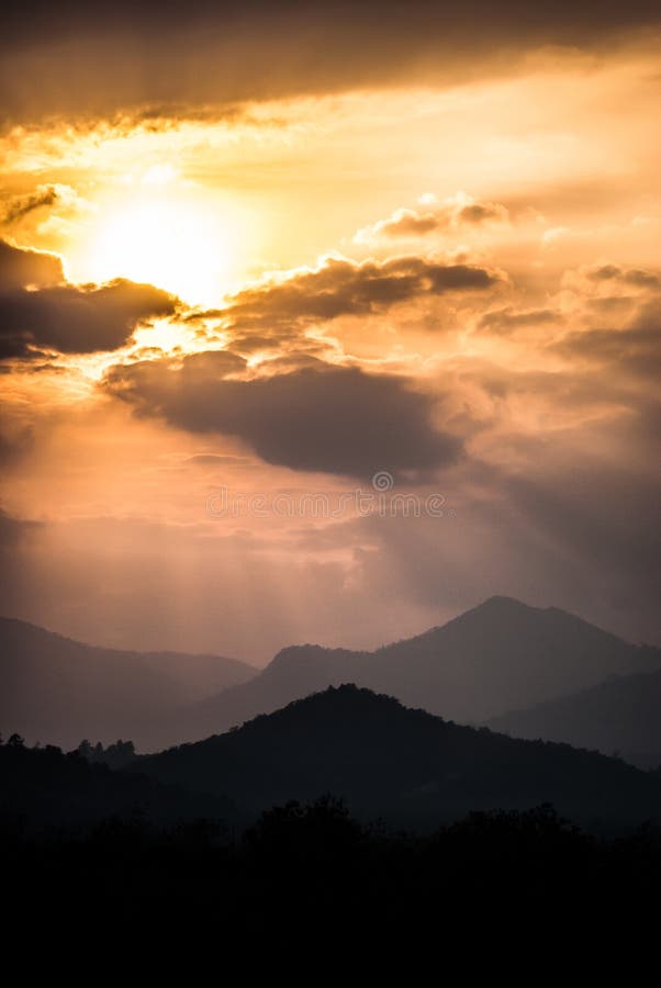 Sunset Behind the Mountains Stock Photo - Image of cloudy, dawn: 37692938