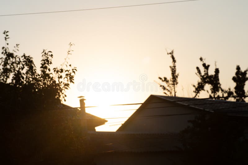Sunset Behind Old Houses.Sunset Behind Old Houses Stock Photo - Image ...
