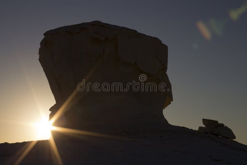 Sunset behind a rock stock image. Image of mushroom, rock - 26112097