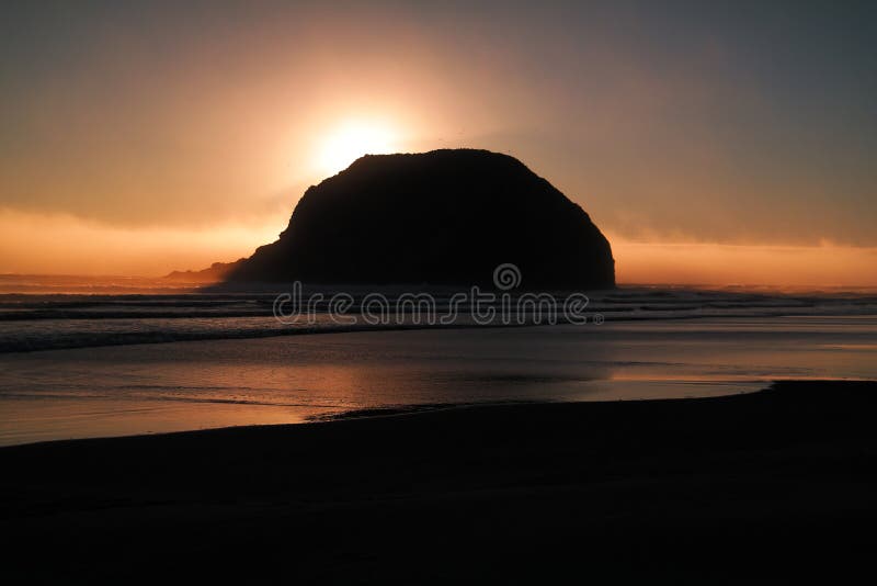 Sunset behind the rock stock image. Image of sand, coast - 57202131