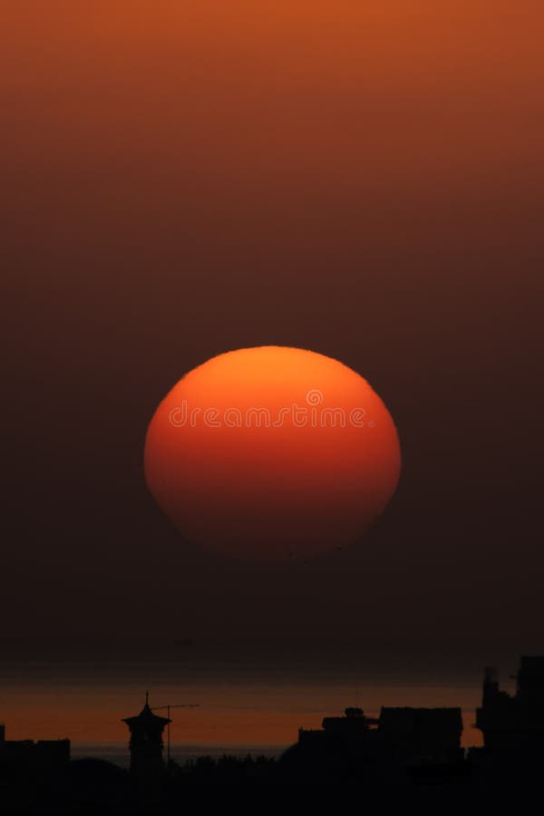 Sunset Behind Urban Buildings Stock Photo - Image of sunset ...