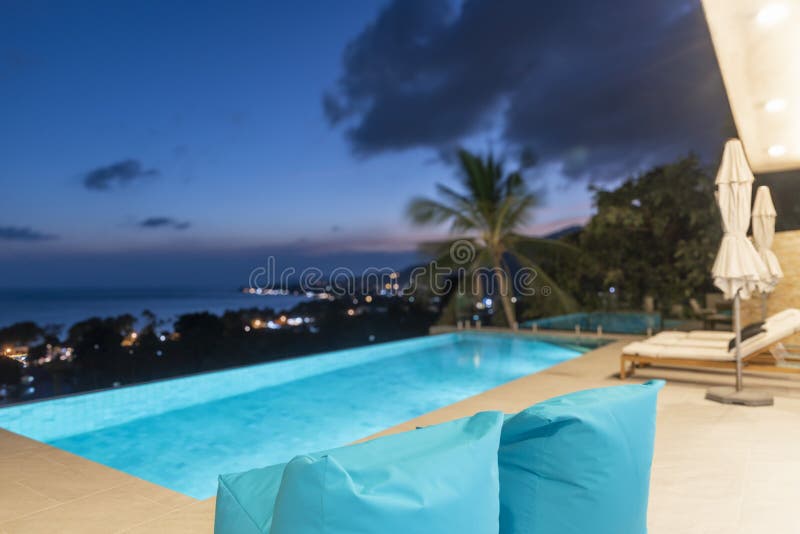 Sunset Bliss Poolside Escape with Ocean View. Stock Photo - Image of ...