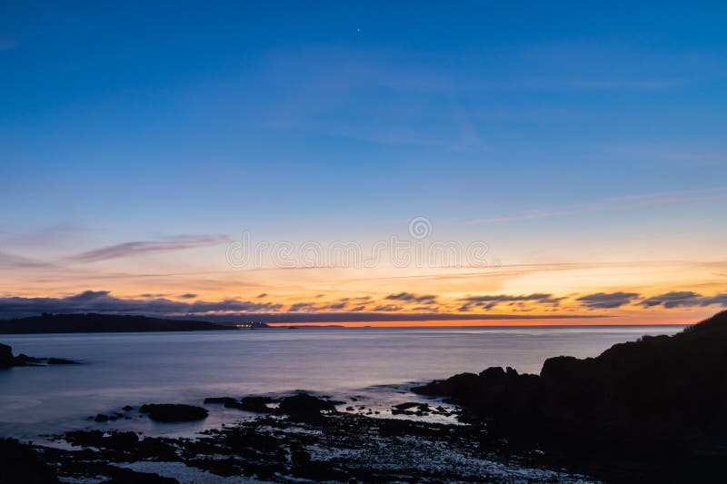 Sunset in the Blue Hour with Long Exposure with the Cliffs in Front ...
