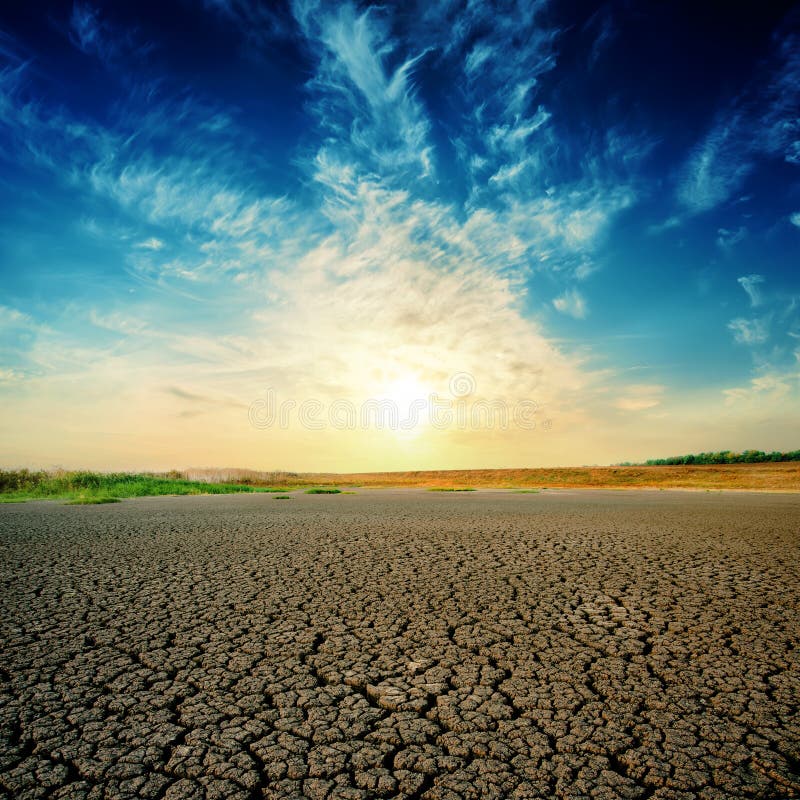 Sunset in Blue Sky Over Drought Earth Stock Photo - Image of beautiful ...
