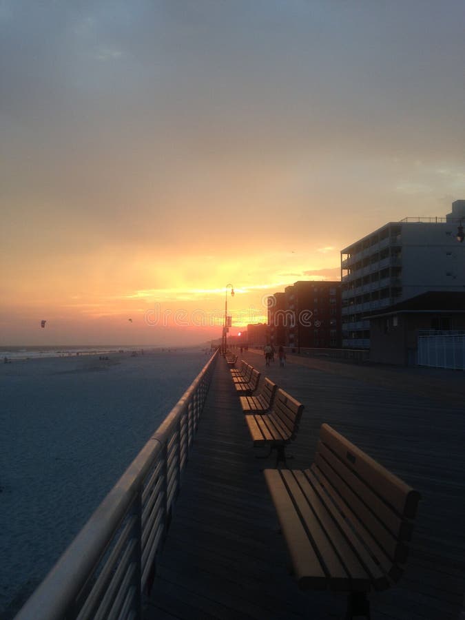 Sunset on Boardwalk on Long Beach. Stock Photo - Image of gull, island ...