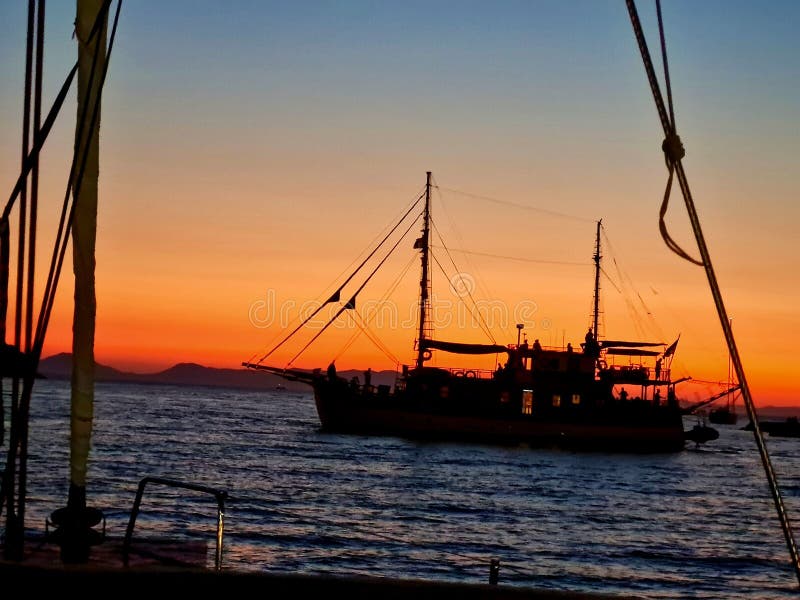 Sunset in the Sea with a Boat. Stock Image - Image of horizon, ship ...