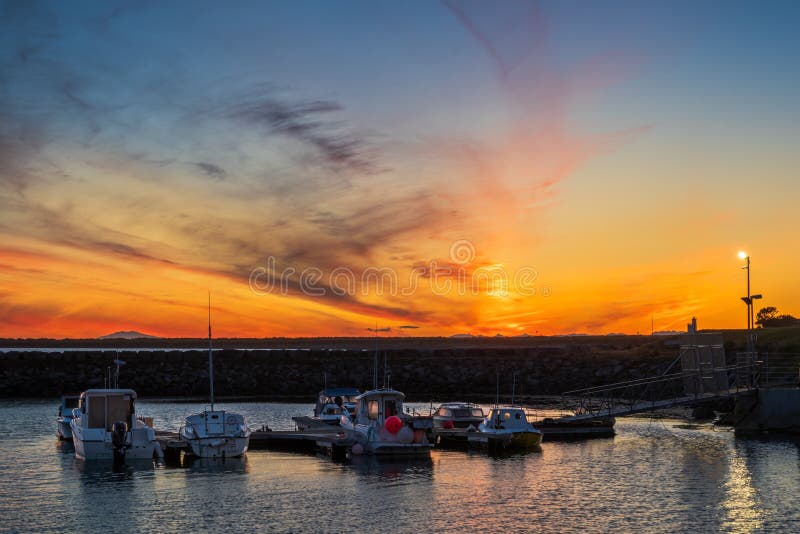 Sunset at the boat dock stock photo. Image of scenery - 253203374