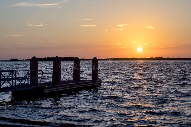Sunset at the Dock stock photo. Image of sail, sailboats - 98744644