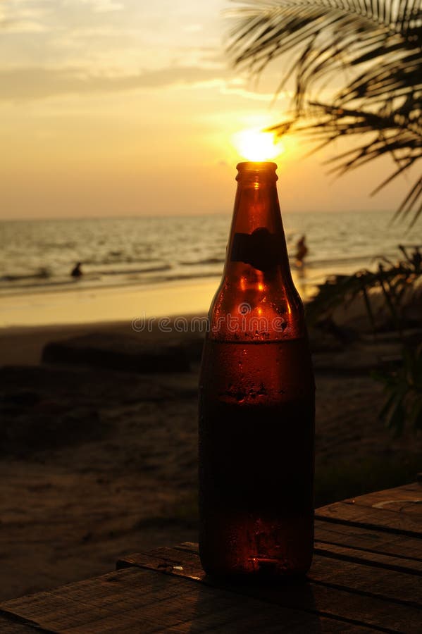 Sunset into bottle stock photo. Image of beer, holiday - 40290672
